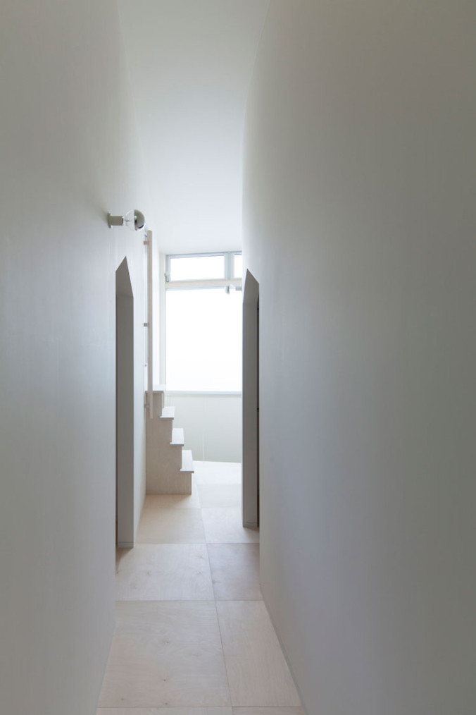 Moon House: a home designed around circular margins of undefined space ...